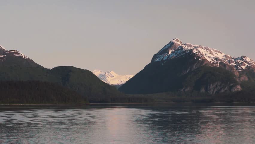 Landscape with snow-capped mountains with ice and water in Alaska image ...