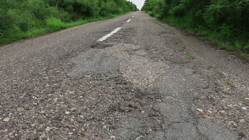 Destroyed The Old Asphalt Road Stock Footage Video 10567721 | Shutterstock