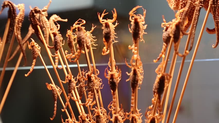 Grilled Scorpions And Meat Pork On Skewers Are On The Counter. China ...