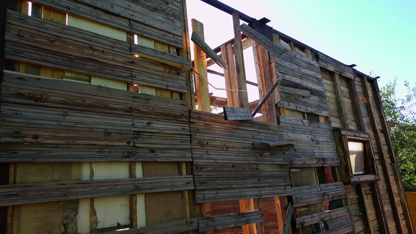 Workers Dismantle And Demolish The Old Wooden House. Shot In 4K (ultra ...