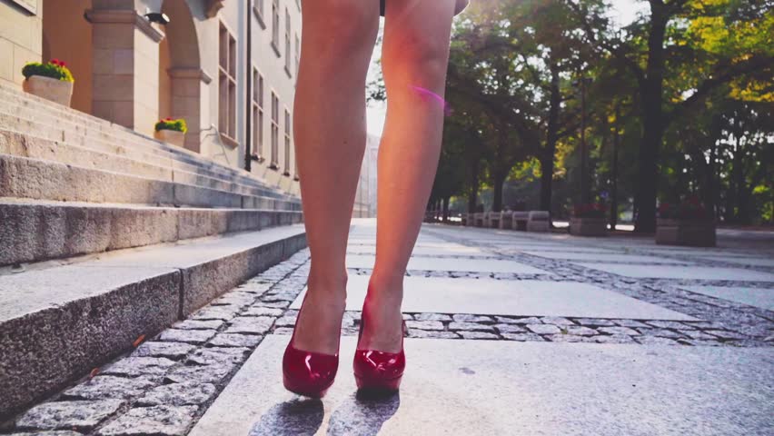 Sexy Woman Legs In Red High Heels Shoes Walking In The City Urban ...