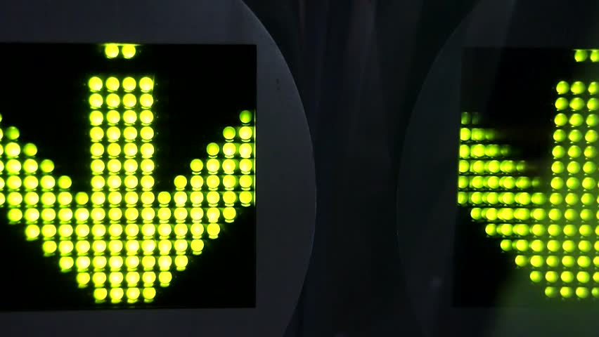 Green LED Light Arrow Pointing Down And Moving Fast Downwards Arrow ...