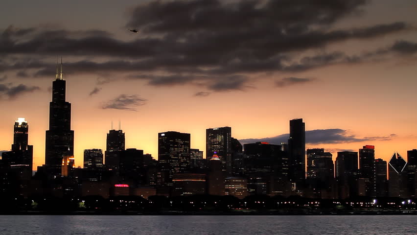 Stock video of helicopter passing over chicago skyline | 1363750 ...