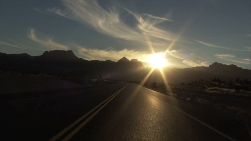 Stock video of car driving at dusk with mountain | 1386280 | Shutterstock