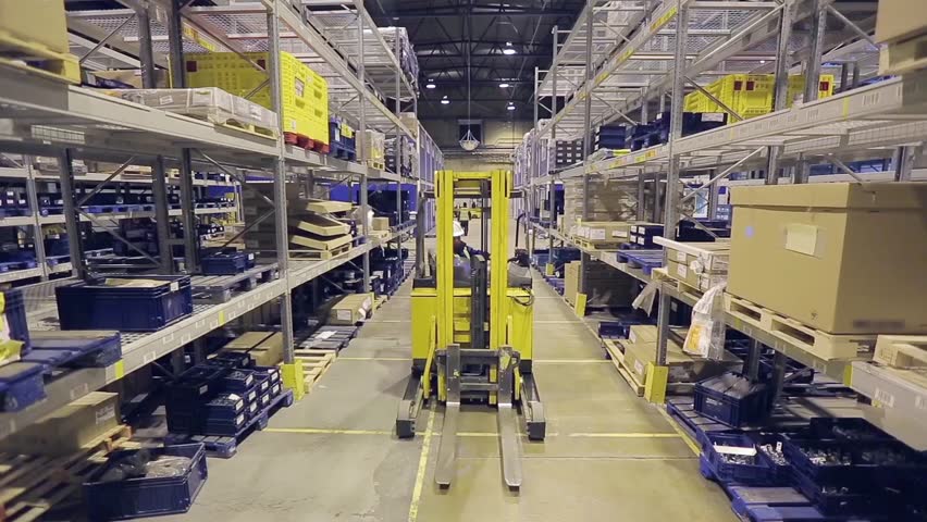 Warehouse Worker Loading Cargo On Rack. Close-up Of Container Stock ...