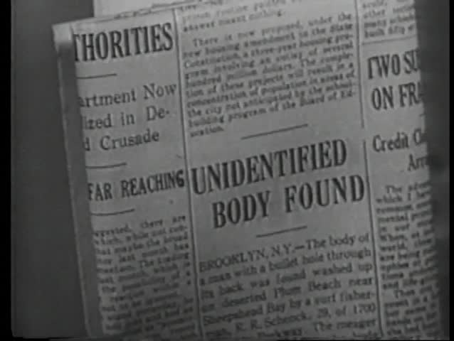 Stock video of close-up hands putting down newspaper and | 1834630 ...