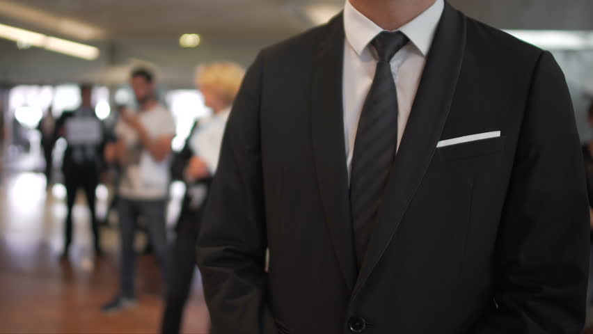 Stock video of man in business suit waiting for | 18970660 | Shutterstock