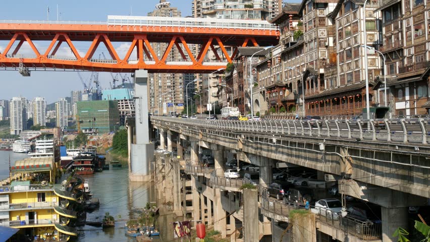 CHONGQING, CHINA - JUNE 2016: Construction Cranes And Skyscrapers Of ...