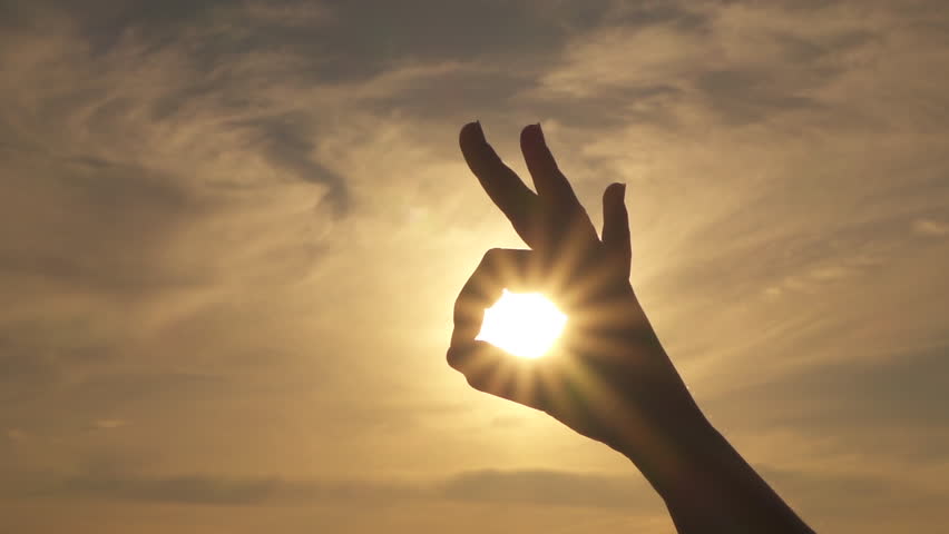 SLOW MOTION CLOSE UP: Sun Shining Through Fingers Of A Waving Hand ...