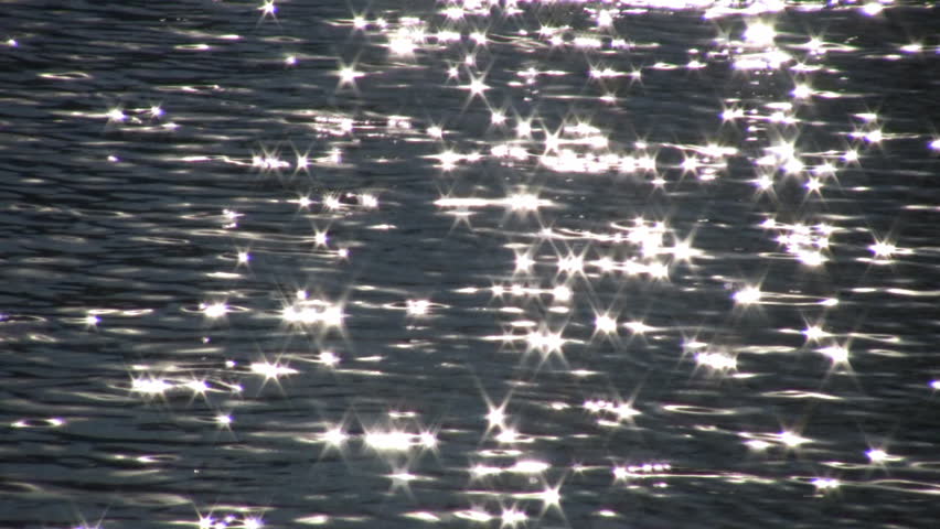 Scintillating Sun Reflections Create Diamond Stars On The Waves Near ...