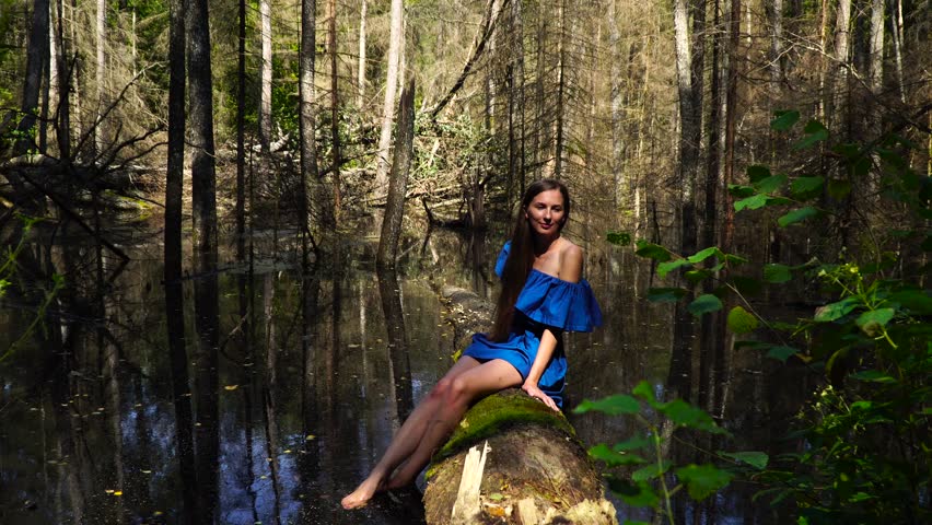 A Woman in a Blue Stock Footage Video (100% Royalty-free) 21886780 ...