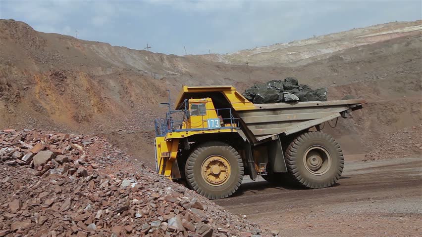 Big Yellow Truck In A Career Of Iron Ore Mining, Delivery By The Motor ...