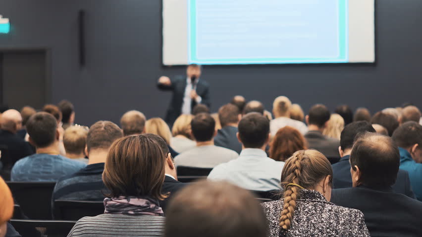 People Listening To Speaker During Business Educational Training ...