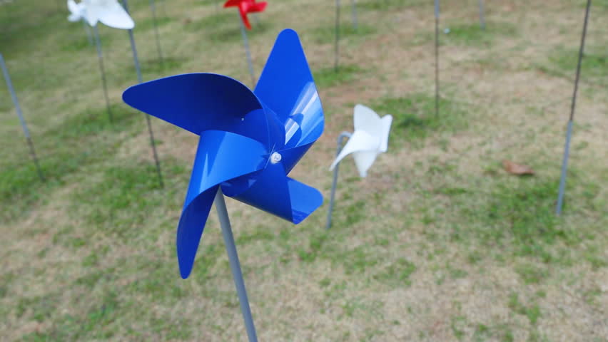 Wind Turns The Windmill. A Child's Toy In The Garden. The Park In The ...