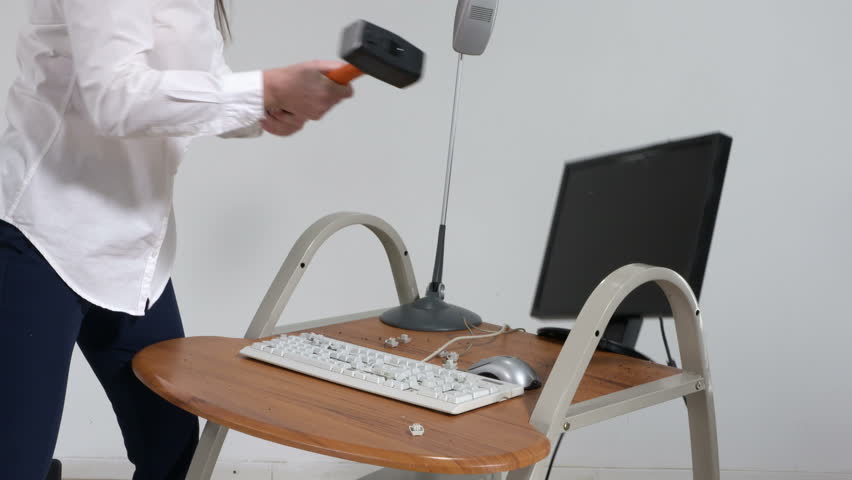 Angry Woman Office Worker Destroying Desktop Computer With Sledgehammer ...