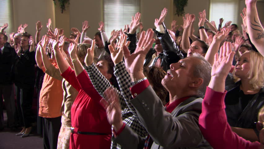 Close View Of Standing Congregation Singing With Closed Eyes Stock ...