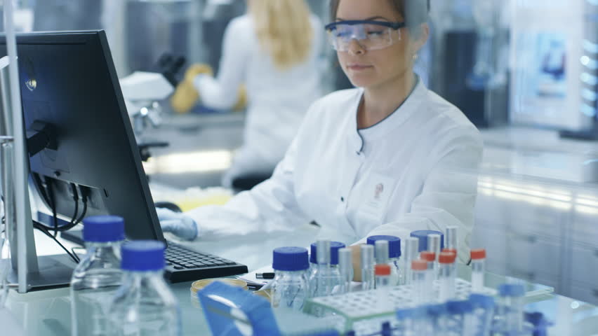 Chemical Reaction And Analysis In Pharmaceutical Laboratory Stock ...