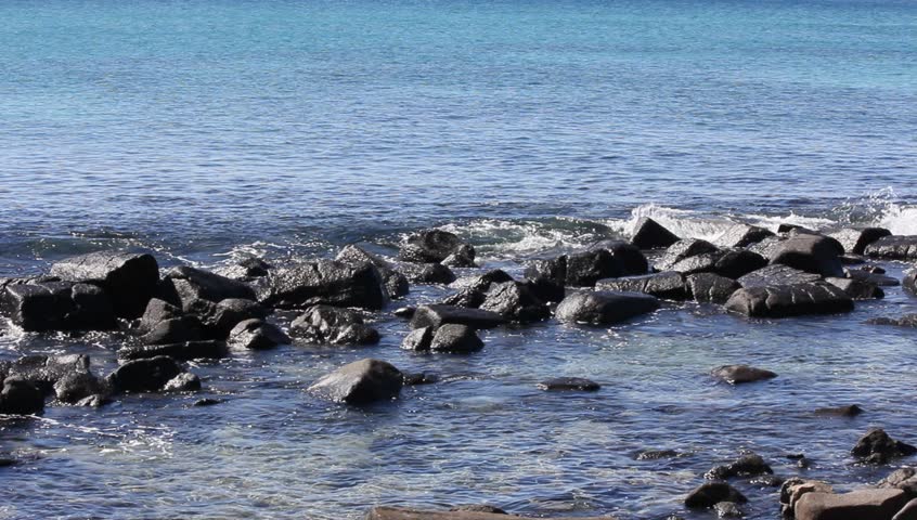 Calm Sea Lapping Over Rocks Stock Footage Video (100% Royalty-free ...