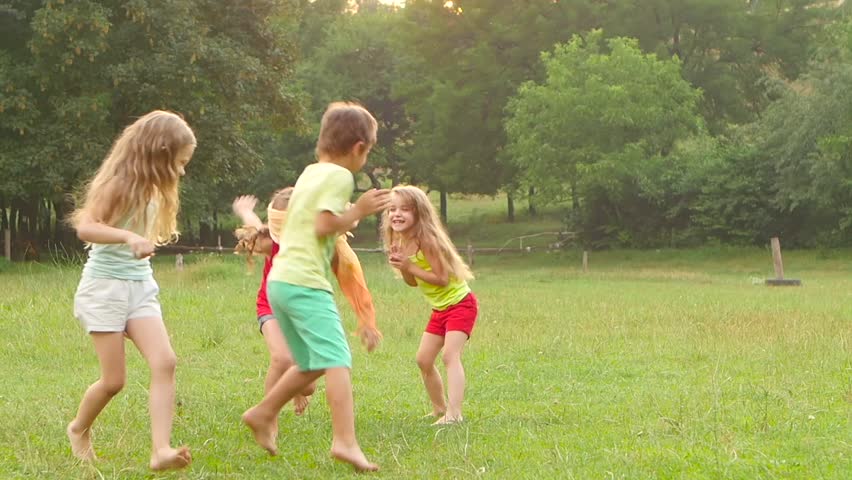 Cheerful Children Playing Tag with Stock Footage Video (100% Royalty ...
