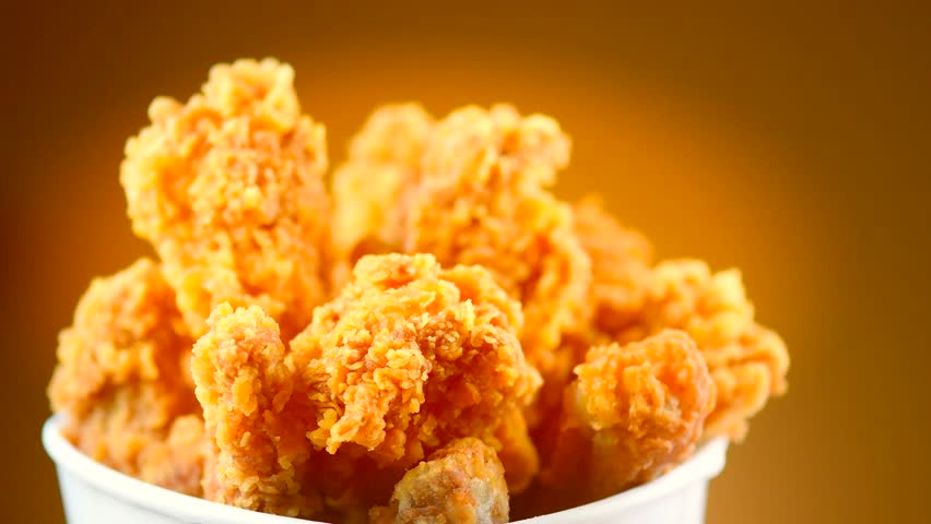 Rotation Bucket Full Of Crispy Fried Chicken On Brown Background. UHD ...