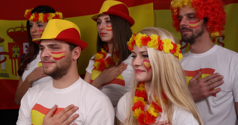 Stock Video Clip of Spanish Group of Supporters People Fans Listen ...