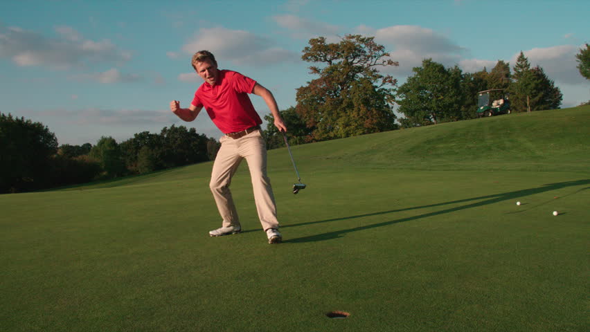 A Golfer Celebrates His Successful Stock Footage Video (100% Royalty ...
