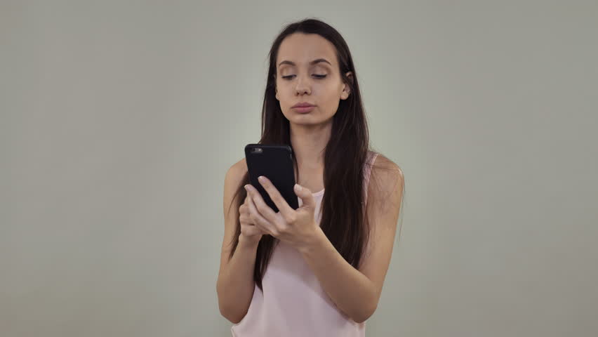 Young Caucasian Woman With Long Hair Using Smartphone. Attractive ...