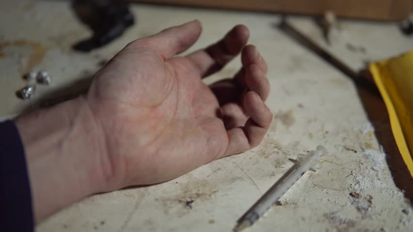 Stock Video Clip of Male Drug Addict's Hand Twitching After Injecting ...