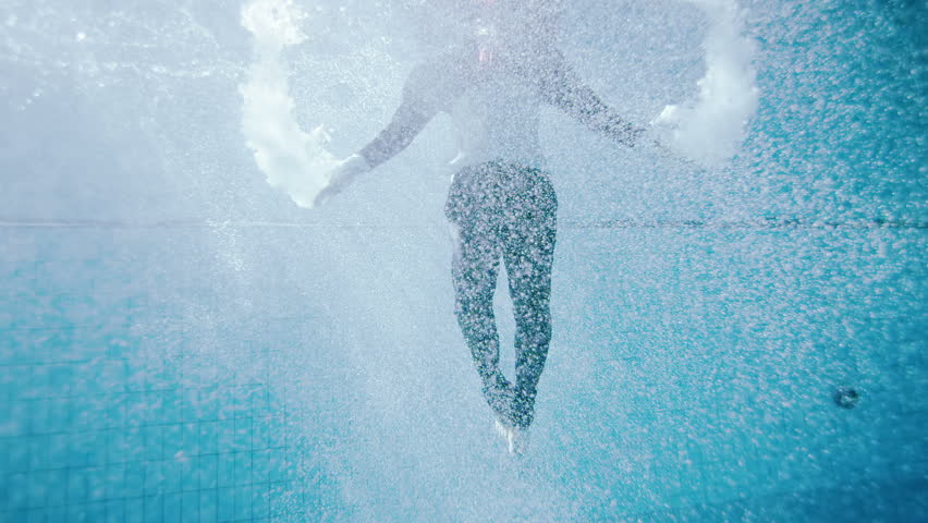 Stock video of drowning underwater businessman, treading water to ...