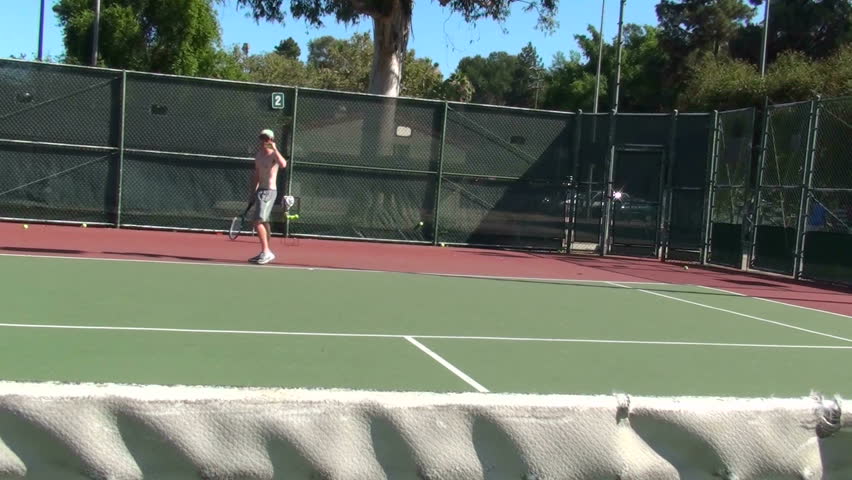 Tennis Serves from Behind Net Stock Footage Video (100% Royalty-free ...