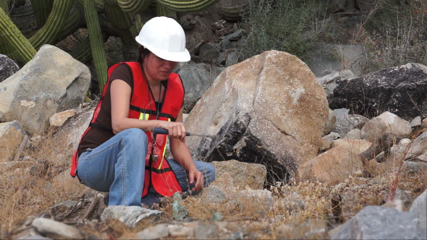 Stock video of female geologist or prospector picks up | 5037140 ...