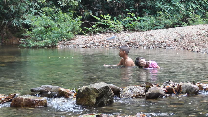 Kids Play in the Stream Stock Footage Video (100% Royalty-free) 5372990 ...