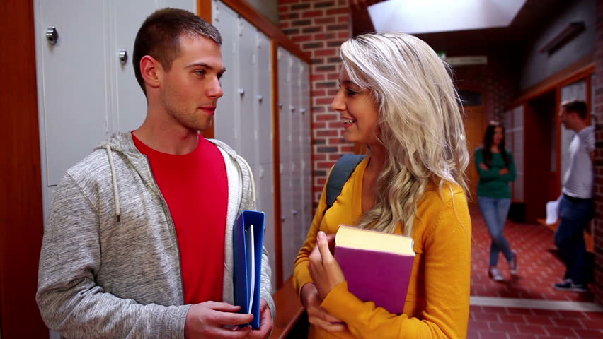Stock video of two cute students flirting in the | 5659490 | Shutterstock