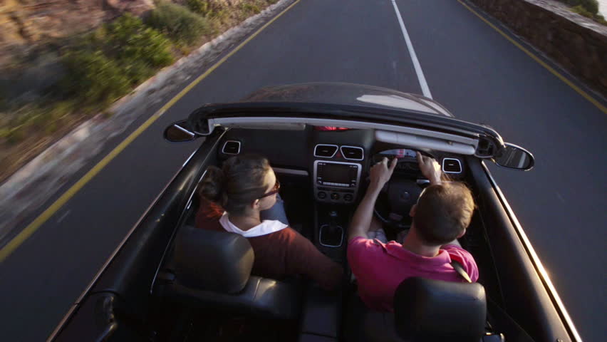 Car Couple Driving On Road Trip Travel Vacation In Convertible. Young ...