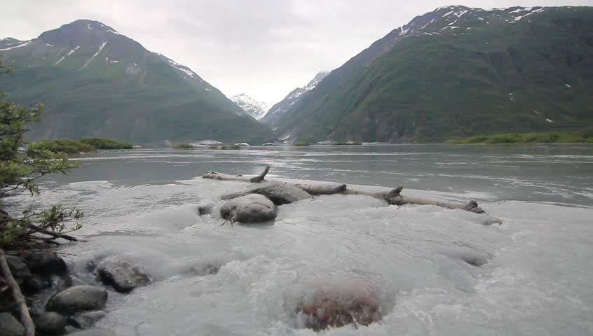 Snow Mountains Trees River Alaska. Water Flowing Down Large River ...