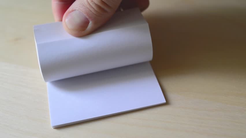 Man Flipping Pages of Small Stock Footage Video (100% Royalty-free ...