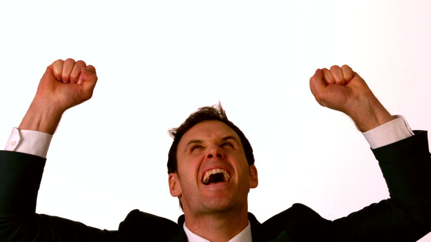 Stock Video Clip of Businessman cheering on white background in slow ...