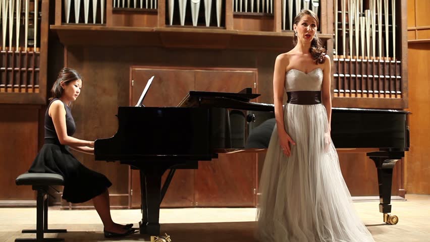 Review Woman Pianist Playing Piano And Opera Singer On Stage Stock ...