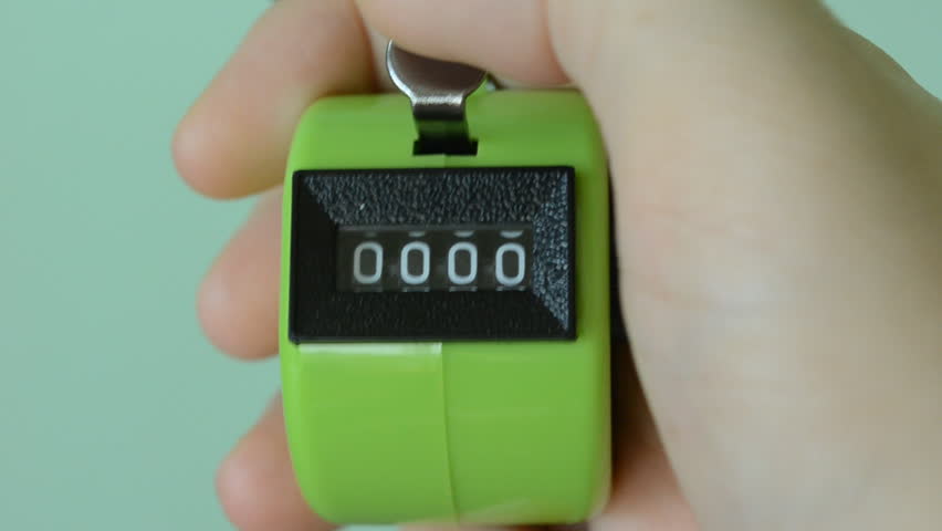 Stock video of hands using manual counting machine counts | 6473960 ...