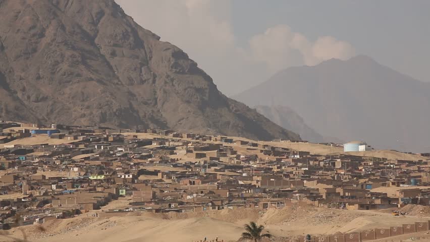 Huts Of A Slum In The Desert Near Lima, Peru. Sun In The Background ...