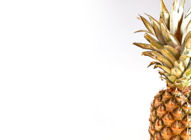 Stock video of rotating pineapple isolated on a white | 662110 ...
