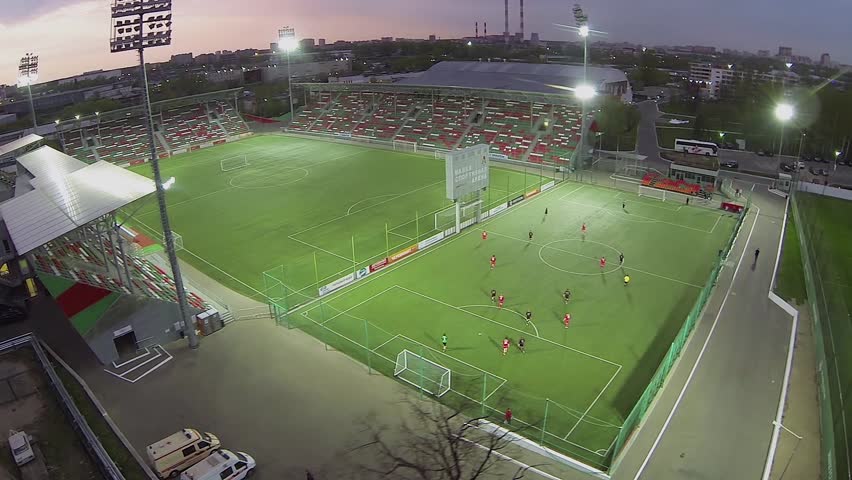 Sportsmen Play Football During Training Of Soccer Team On Small Sports ...
