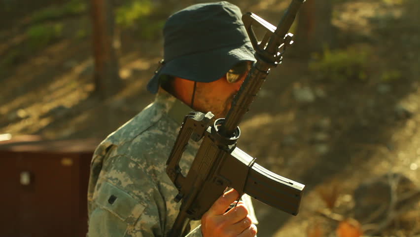 Stock video of paranoid survivalist in the woods | 7668070 | Shutterstock