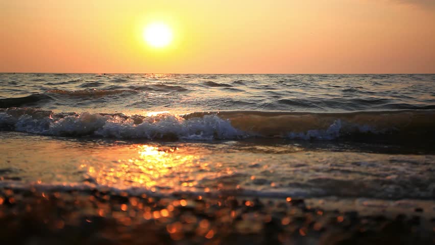 Bright Sunset Under The Sea With Waves Splashes, Fly Spray And ...