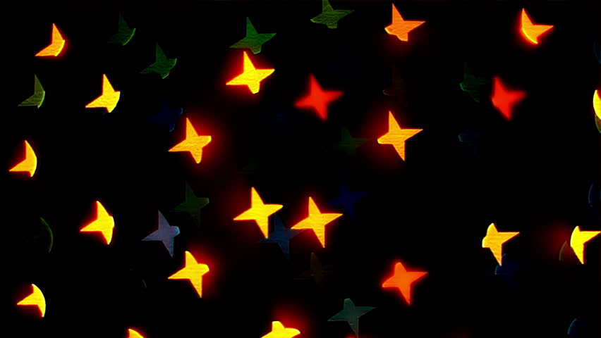 Stock video of star-shaped color light blinking on black | 8095450 ...