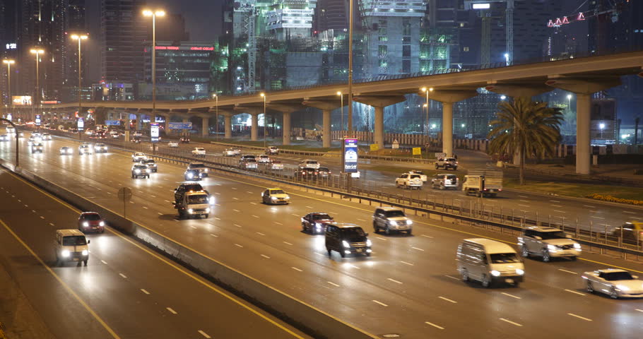 DUBAI, UAE - JANUARY 22, 2014 Sheikh Zayed Road Cars Traffic Jam Bus ...