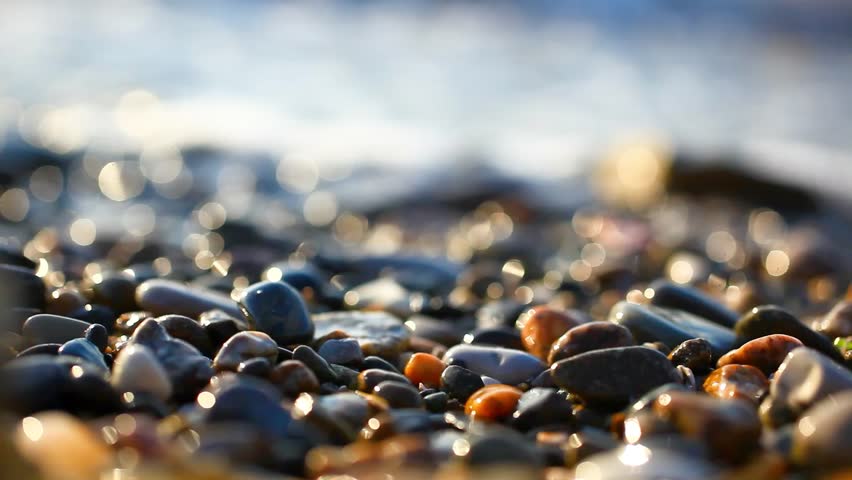 Colorful Pebbles On The Beach At Amazing Sunset With Sea View, Splashes ...