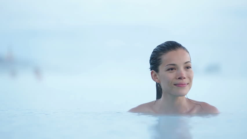 Geothermal Spa. Woman Relaxing In Hot Spring Pool On Iceland. Girl ...