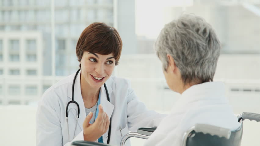 Portrait Elderly Female Patient Hospital Bed Being Reassured By Medical ...