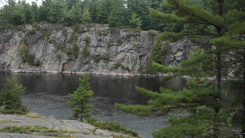 Cliff On Shore Of Canadian River. Ontario, Canada. Cliff On Bank Of The ...